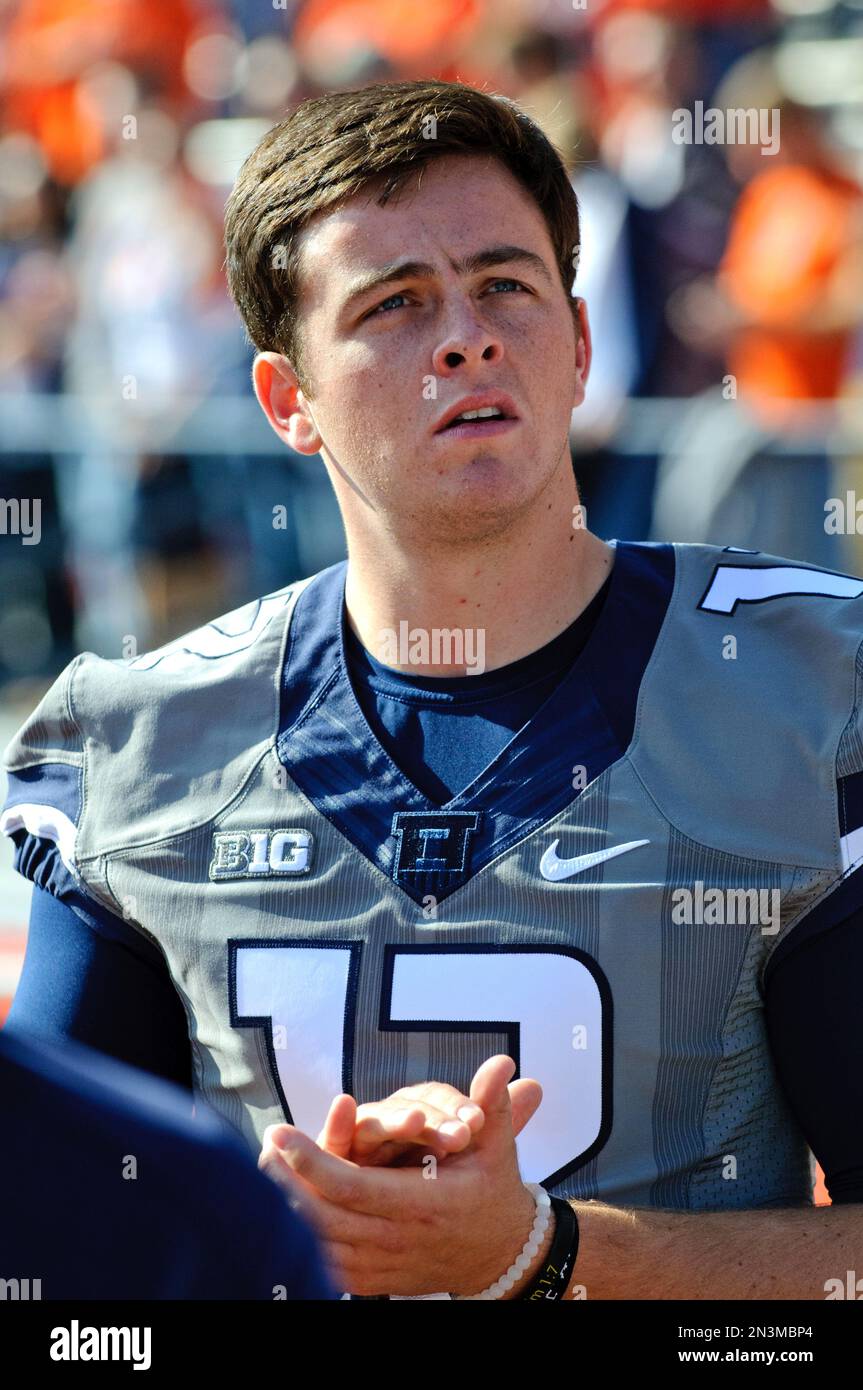 Illinois quarterback Wes Lunt (12) stands on the sidelines before an ...
