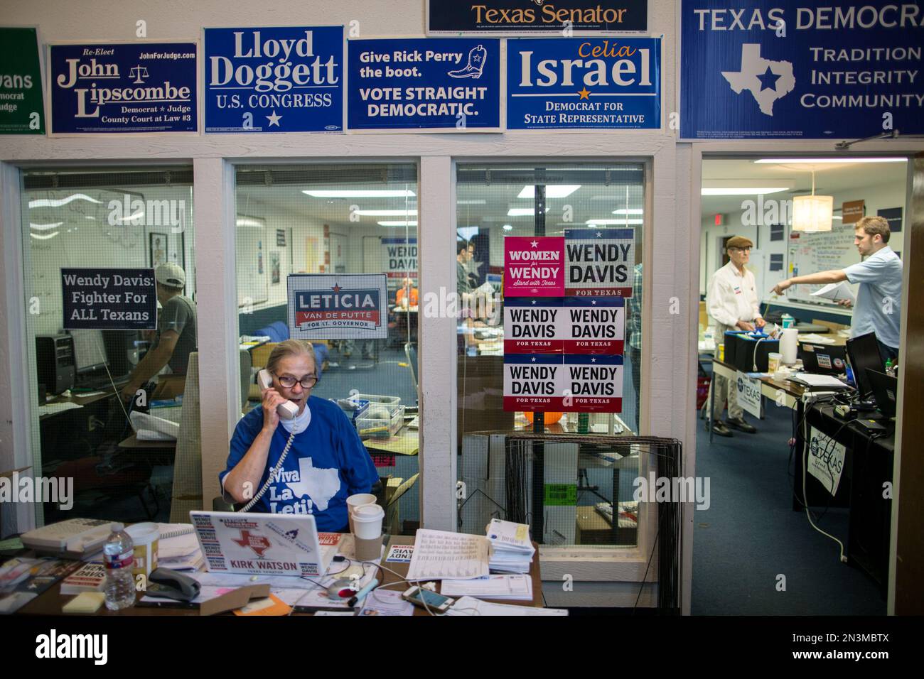 Mary Patrick, a Travis County Democratic Party volunteer, answers phone ...