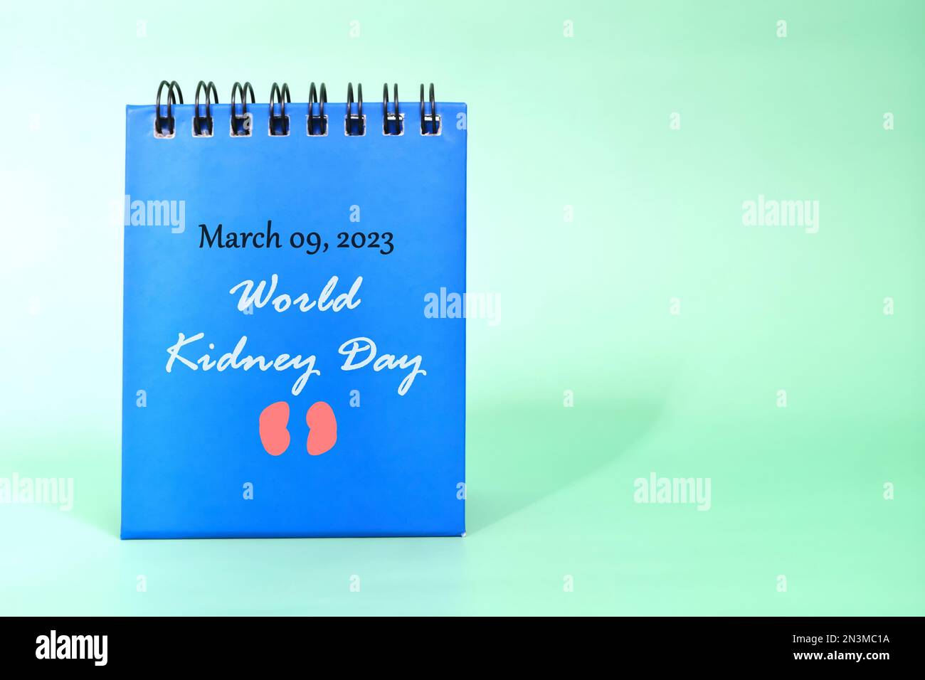 March 9 2023 as World Kidney Day date reminder on blue desk calendar. Celebration concept Stock ...