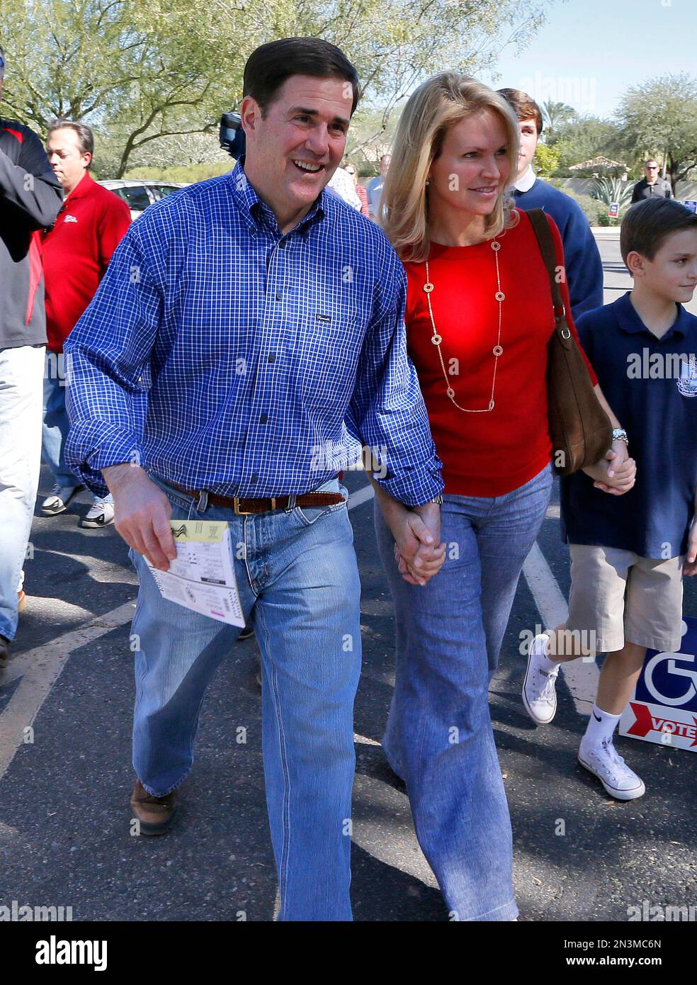 Arizona Republican gubernatorial candidate Doug Ducey, center, arrives ...