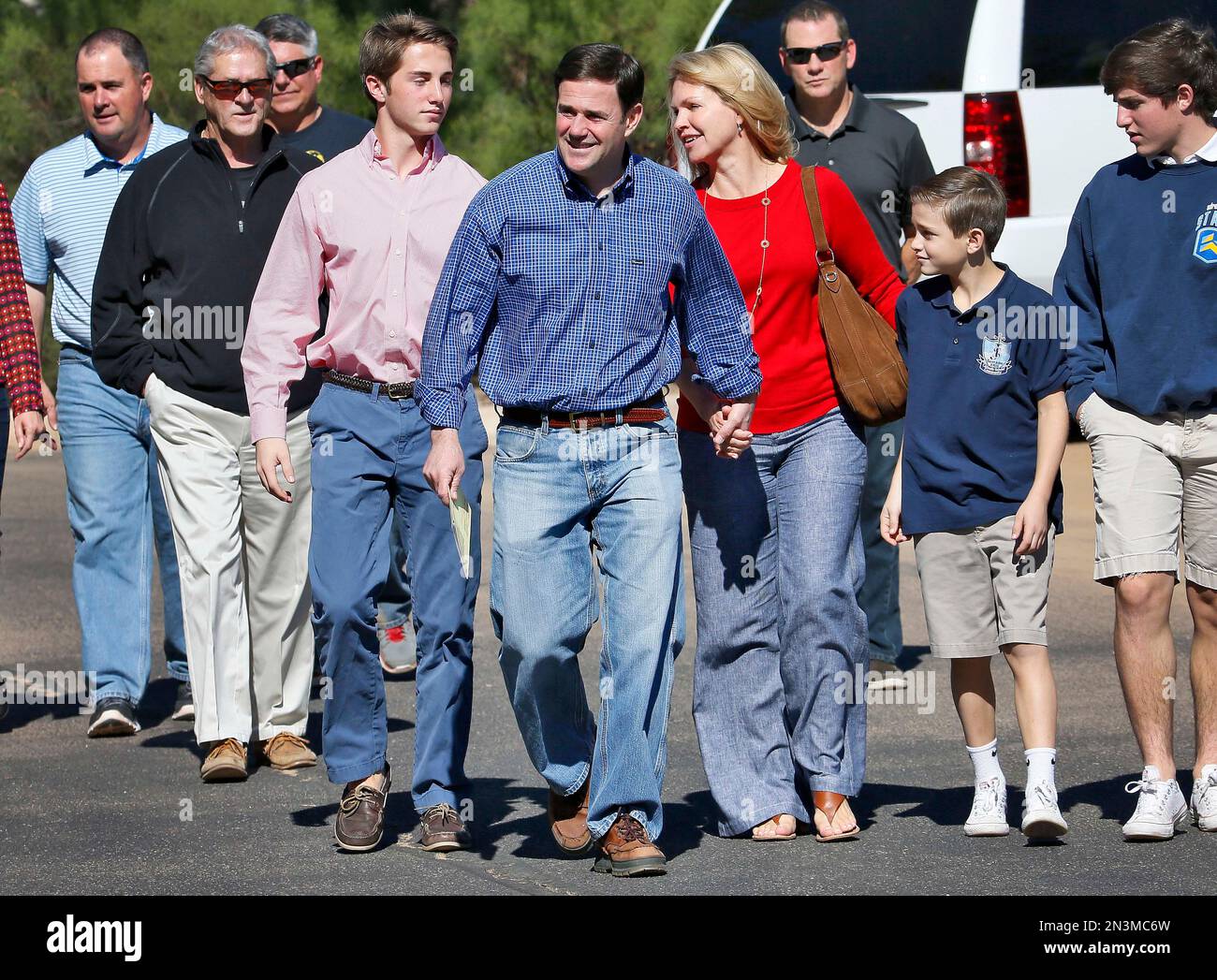 Arizona Republican gubernatorial candidate Doug Ducey, center, arrives ...