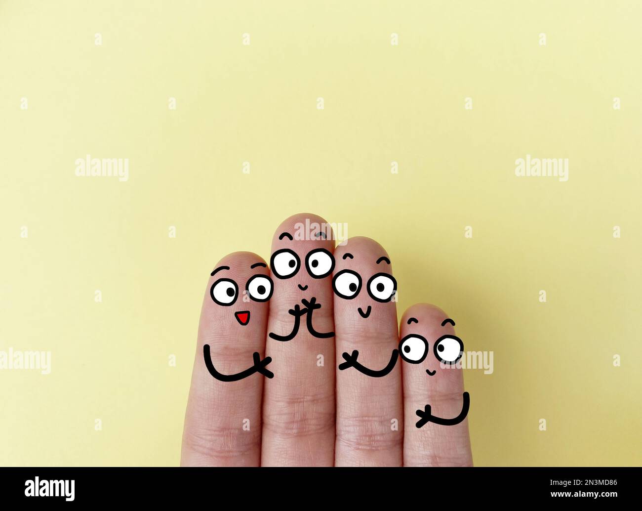 Four fingers are decorated as four person. They are happy Stock Photo ...
