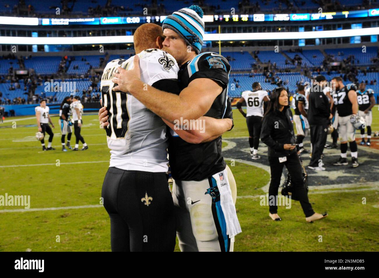 New Orleans Saints tight end Jimmy Graham (80) hugs Carolina Panthers ...