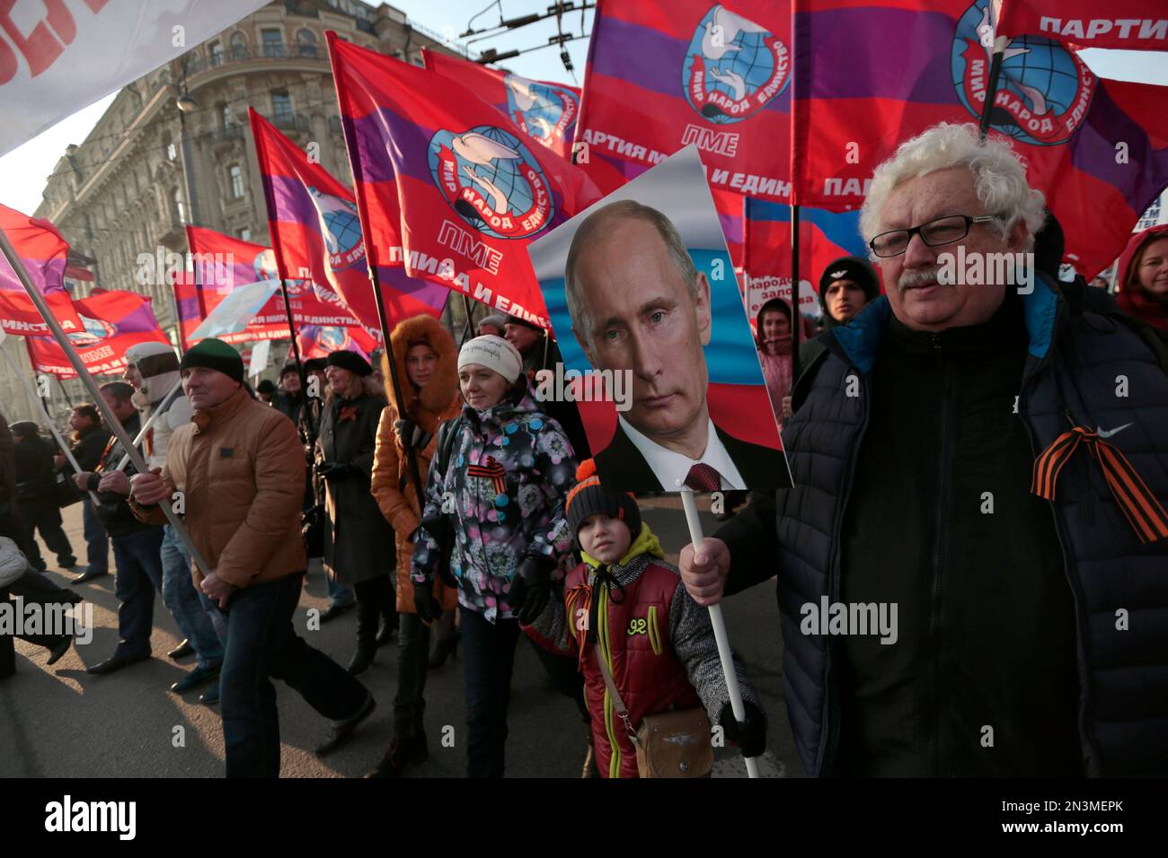 Pro-government groups with Russian flags and portraits of President ...