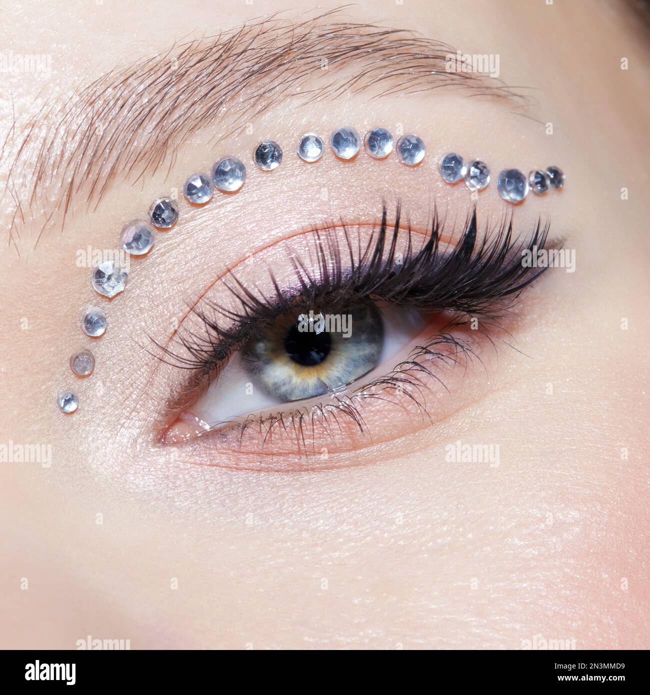 Closeup macro shot of human female eye with unusual makeup. Woman with ...