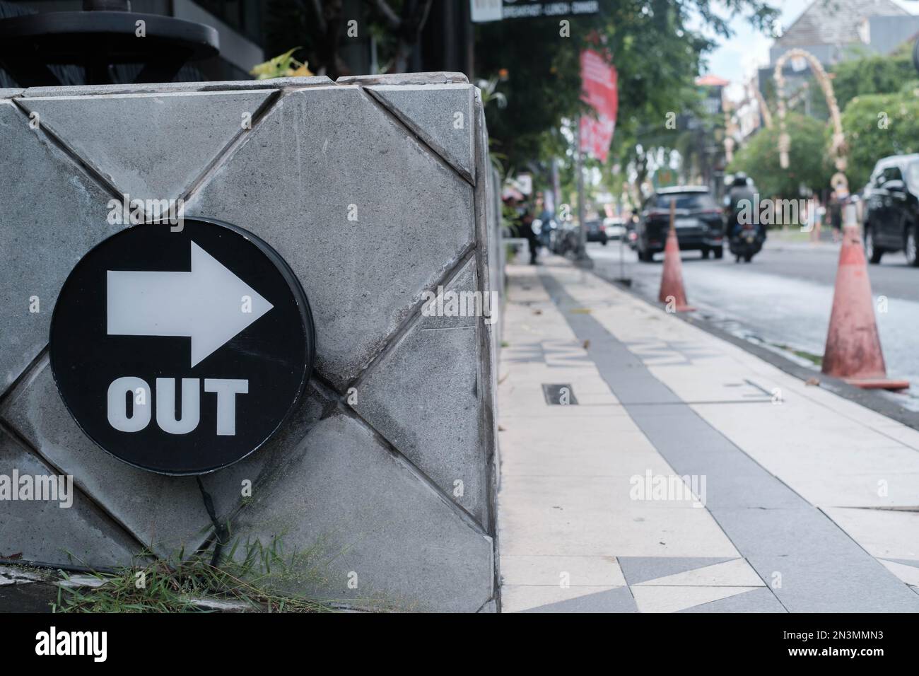 Exit Ahead: Arrow Sign on a Side Street with Blurred Background Stock ...