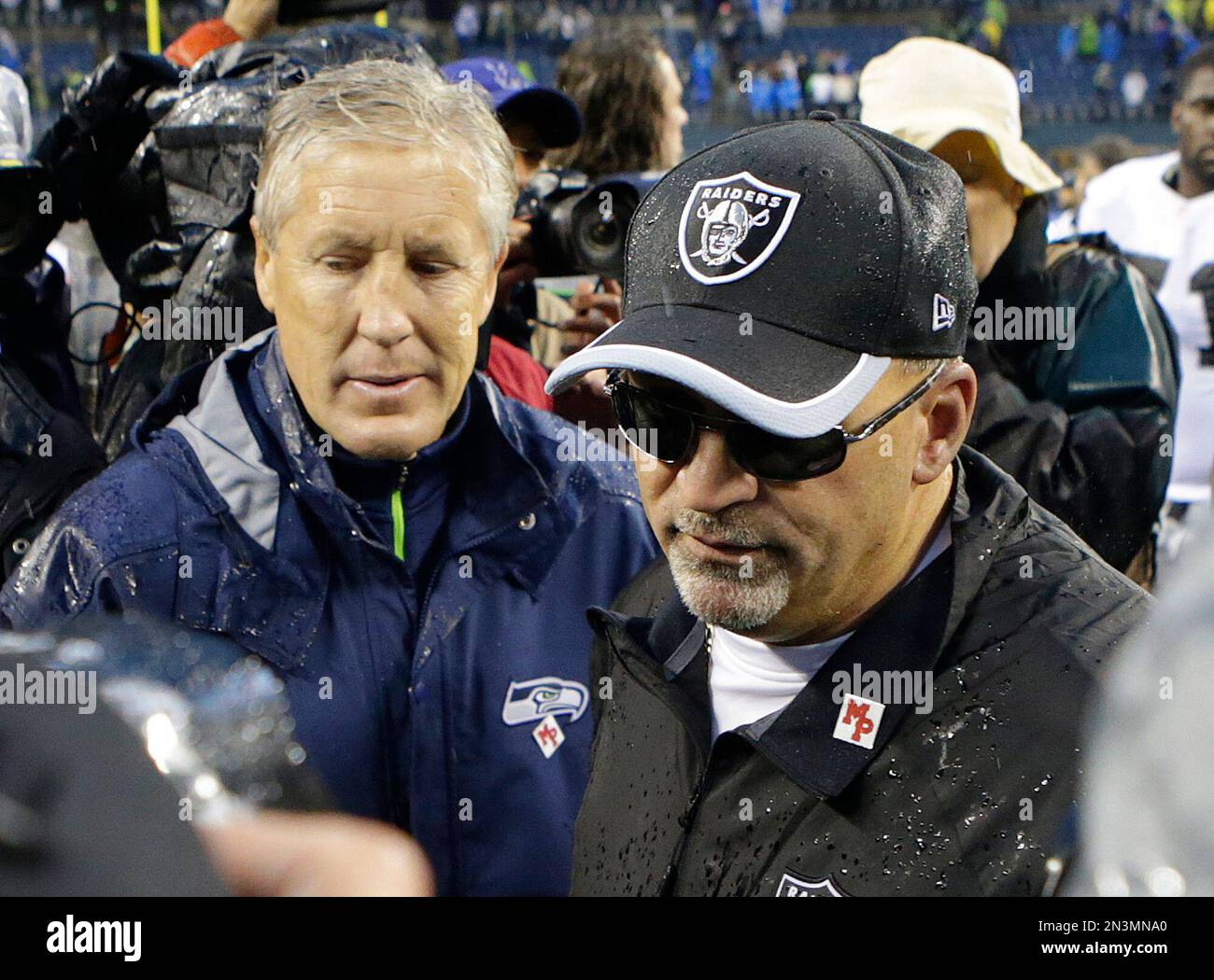 Oakland Raiders Tony Sparano, right, and Seattle Seahawks head coach ...