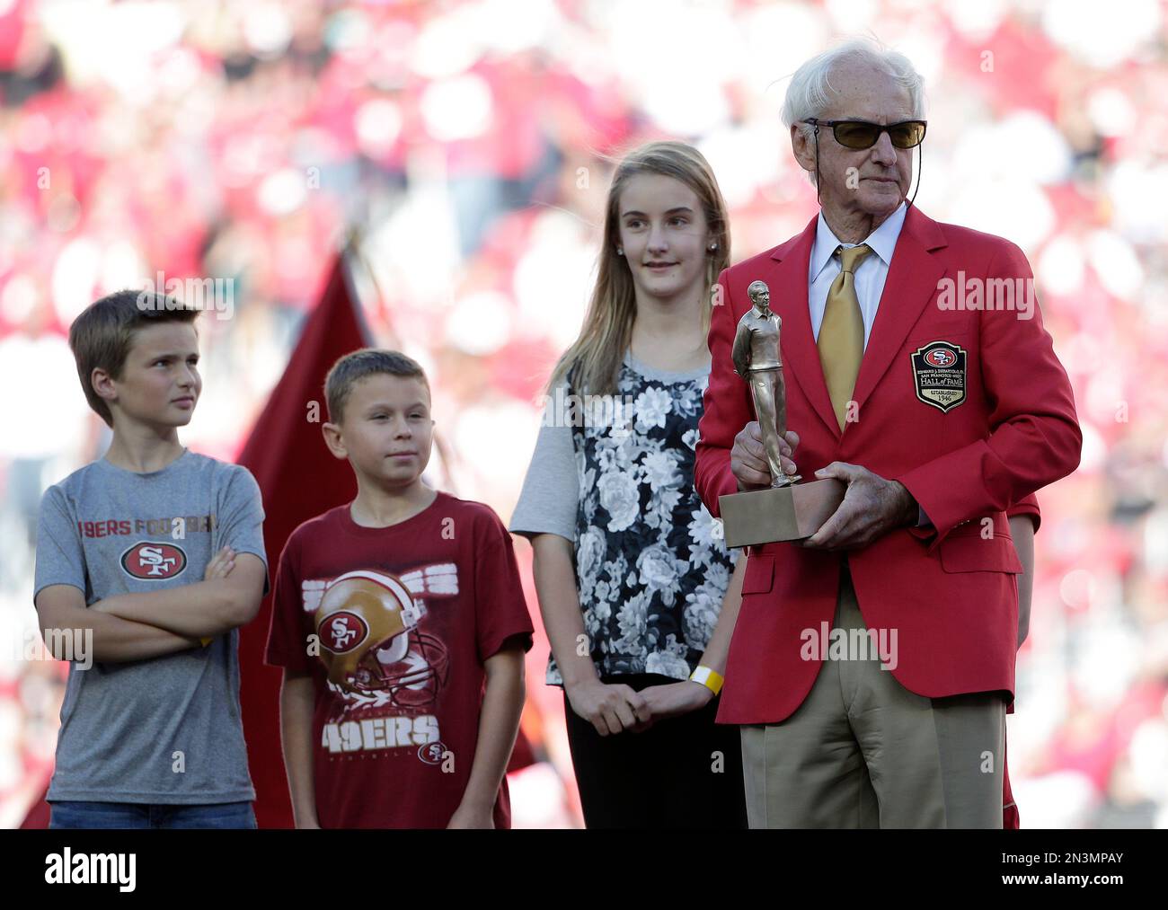 Former San Francisco 49ers head coach George Seifert, right, celebrates ...