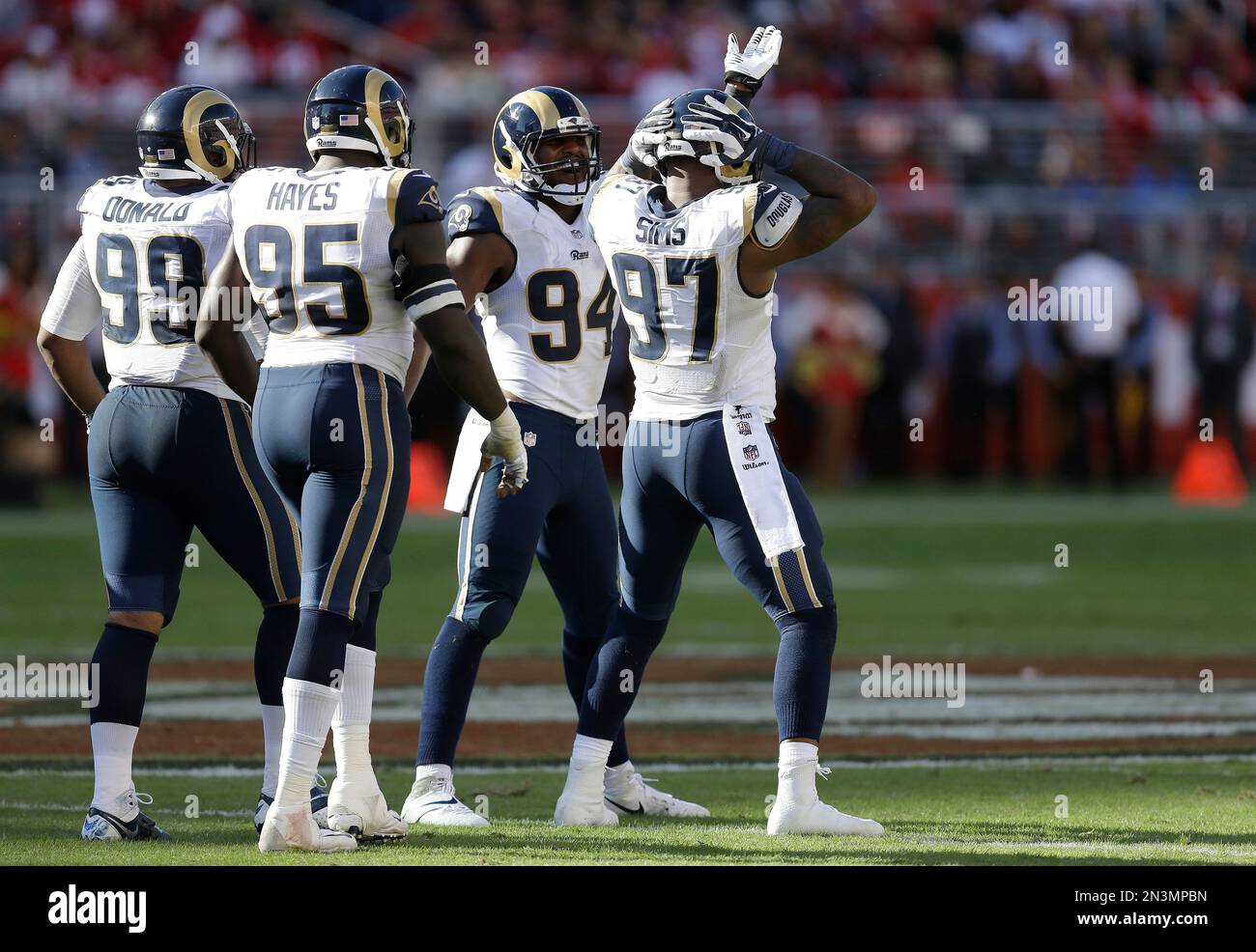 St. Louis Rams defensive tackle Aaron Donald (99), defensive end William Hayes (95), defensive ...