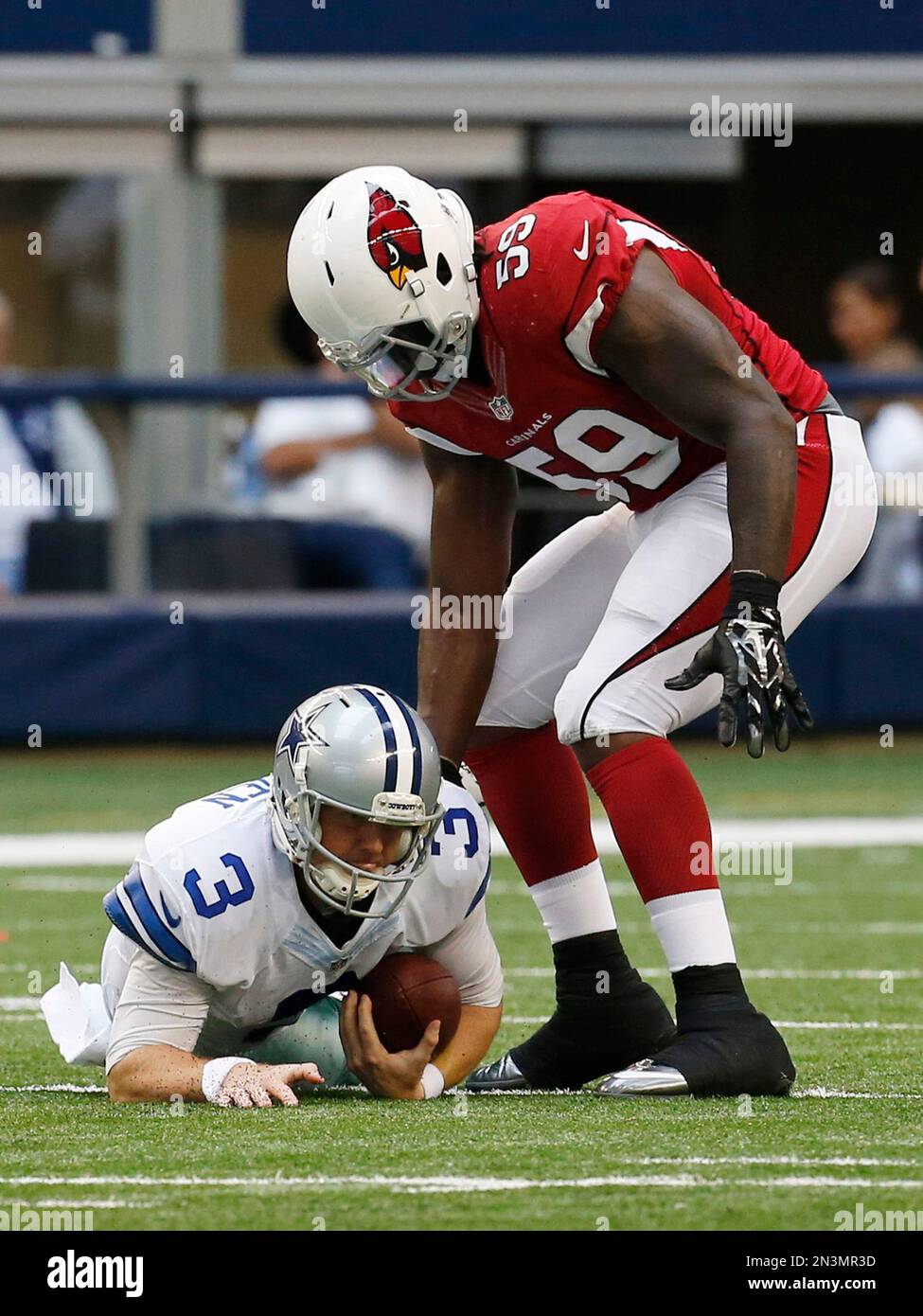 Dallas Cowboys quarterback Brandon Weeden (3) recovers after a play as ...