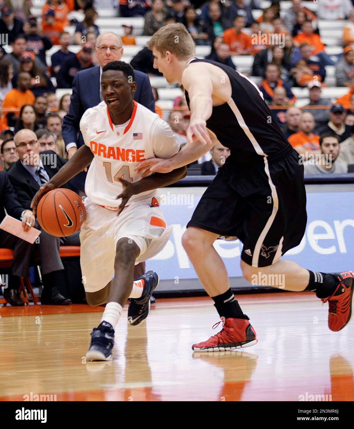 Syracuse’s Kaleb Joseph, left, drives to the basket against Carleton’s ...