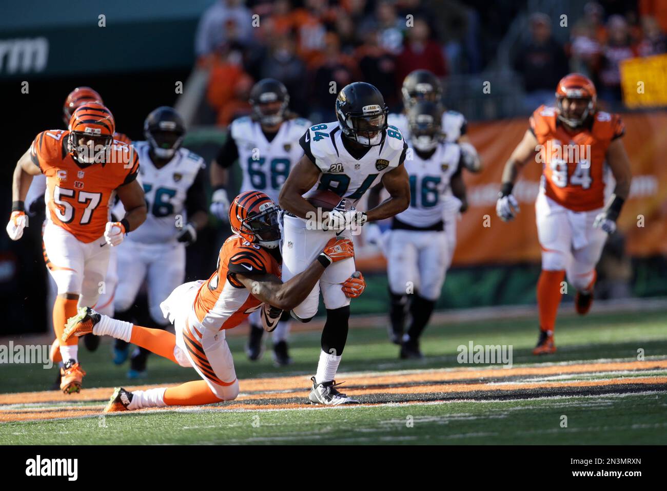 Cincinnati Bengals strong safety George Iloka, left, tackles Cecil ...