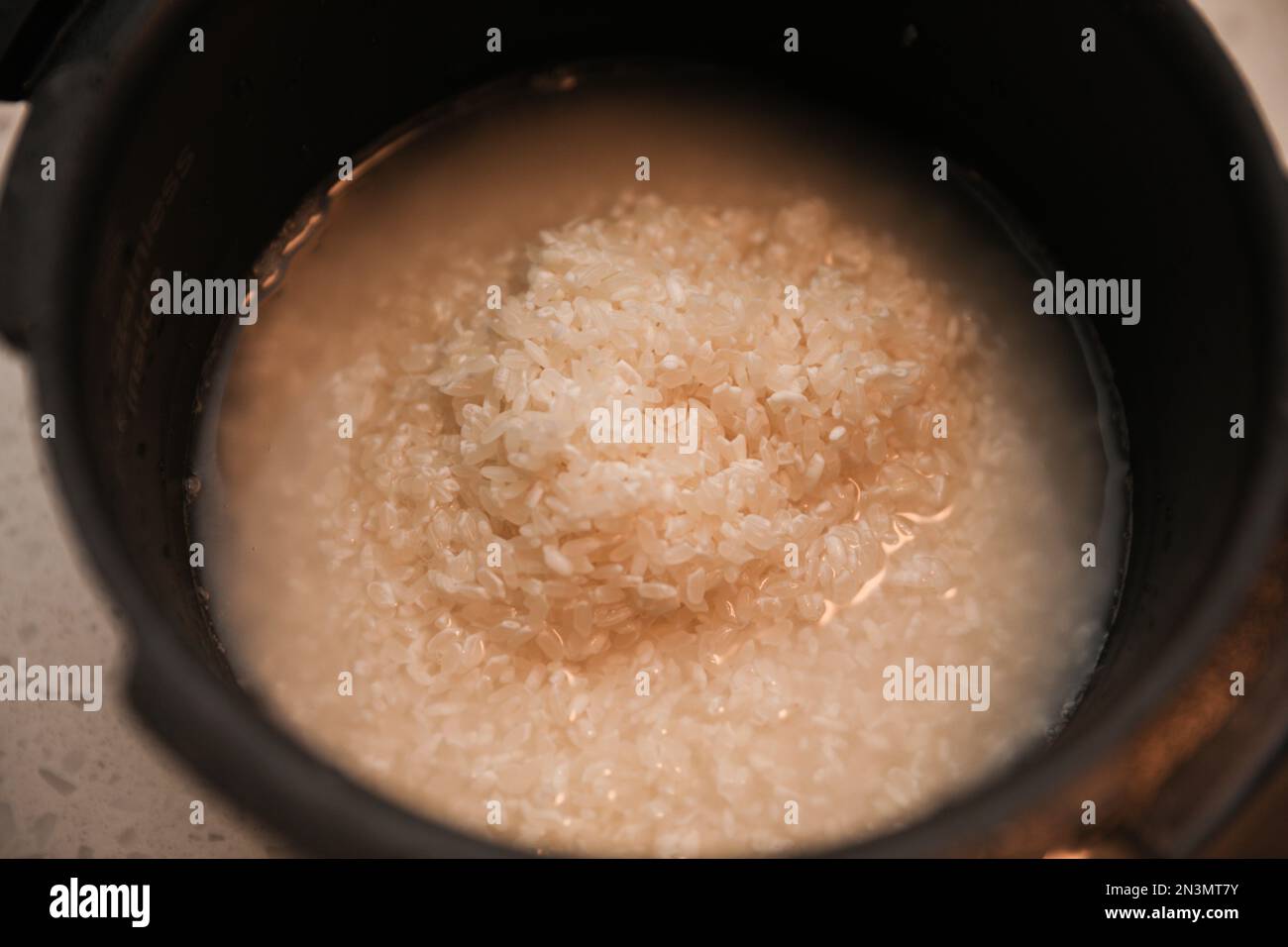 Cooking Rice steps washing and cooked preparation Stock Photo - Alamy
