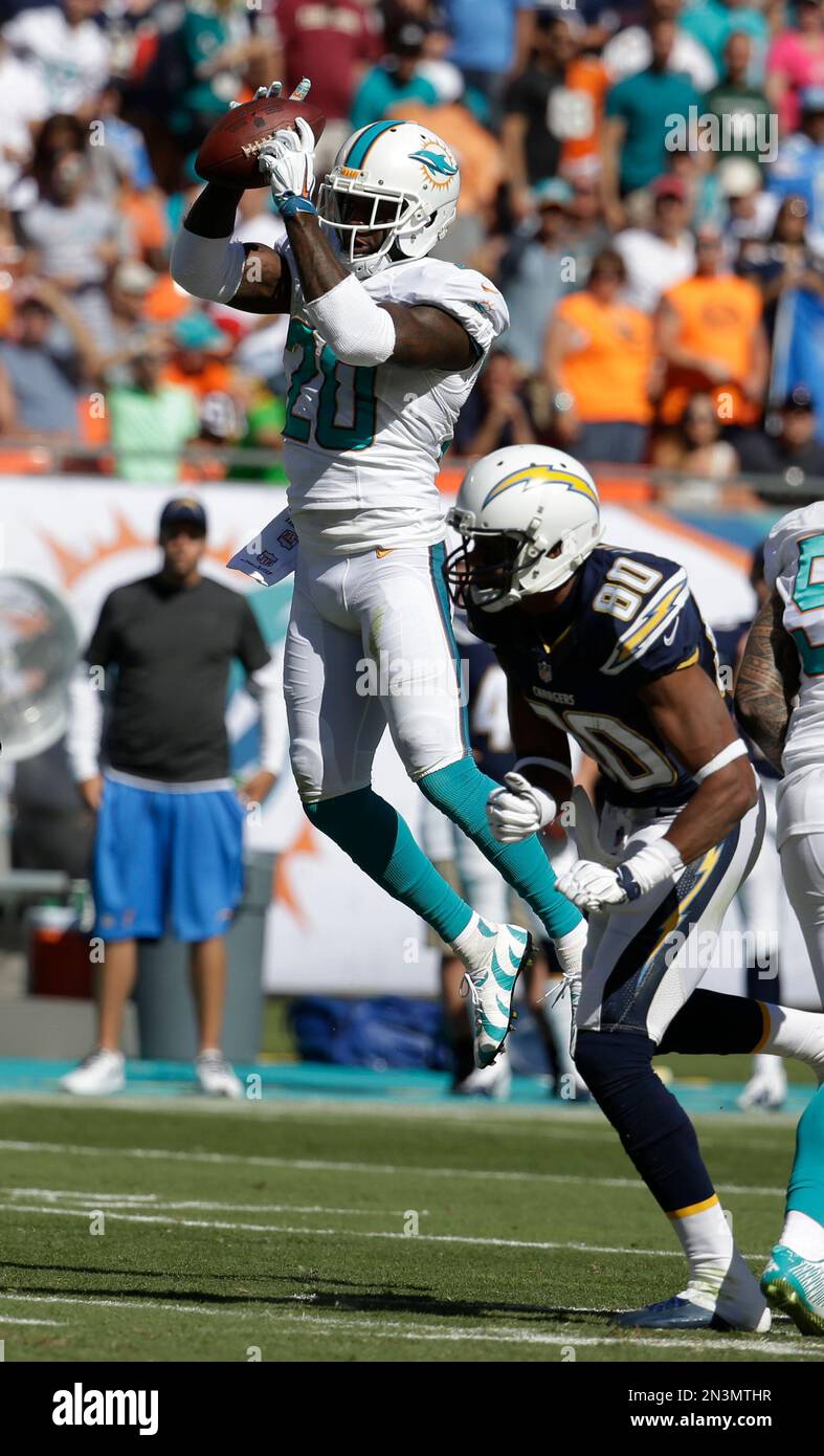 Miami Dolphins strong safety Reshad Jones (20) intercept a pass ...