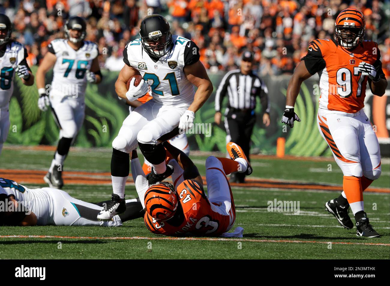 Jacksonville Jaguars running back Toby Gerhart, top, runs over ...