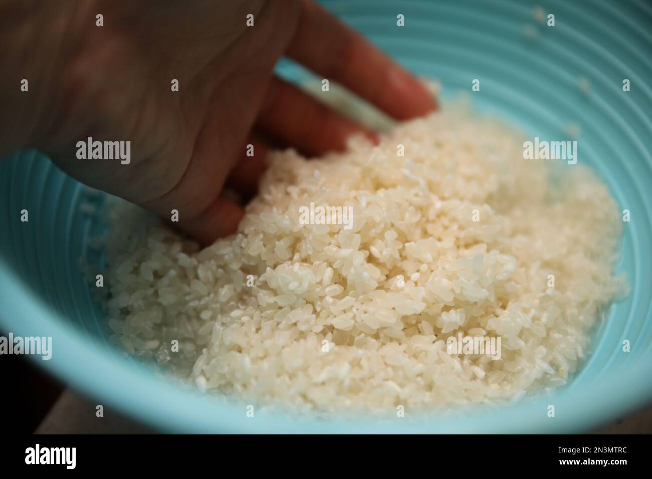 Rice washing bowl hi-res stock photography and images - Alamy