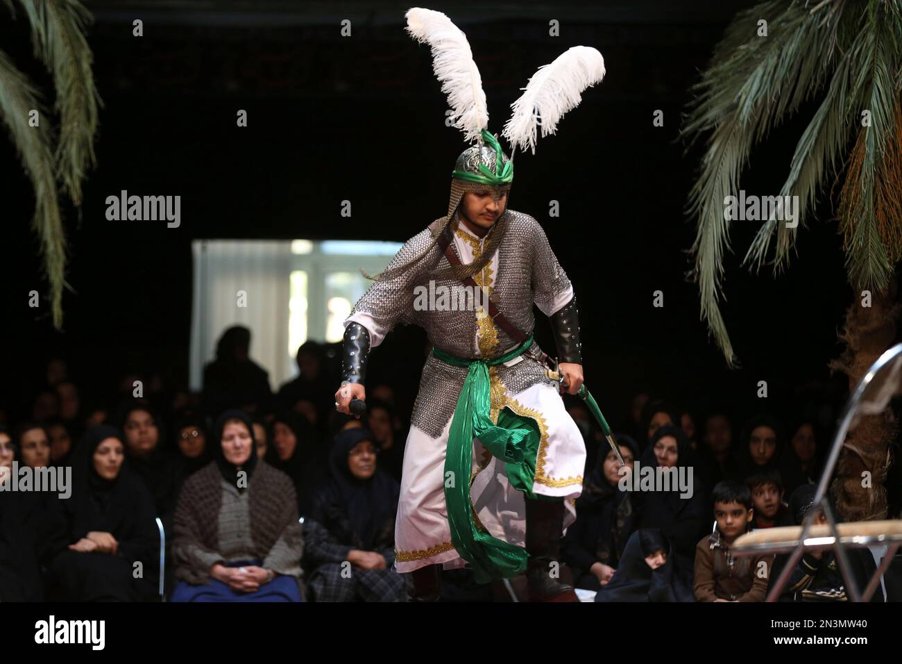 Iranian Mohammad Reza Rajabi performs in a scene called Tazieh, re ...