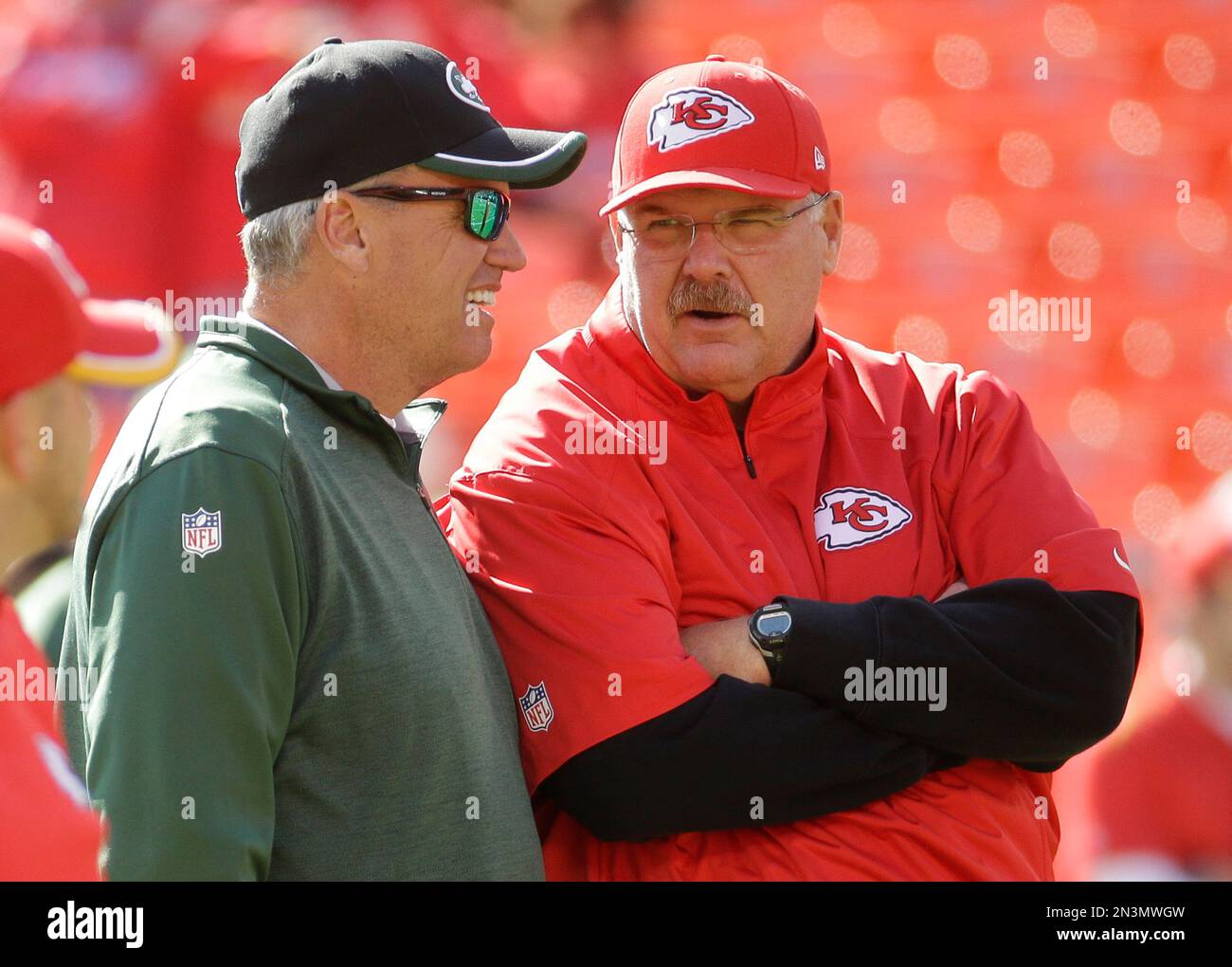 New York Jets head coach Rex Ryan, left, visits with Kansas City Chiefs ...