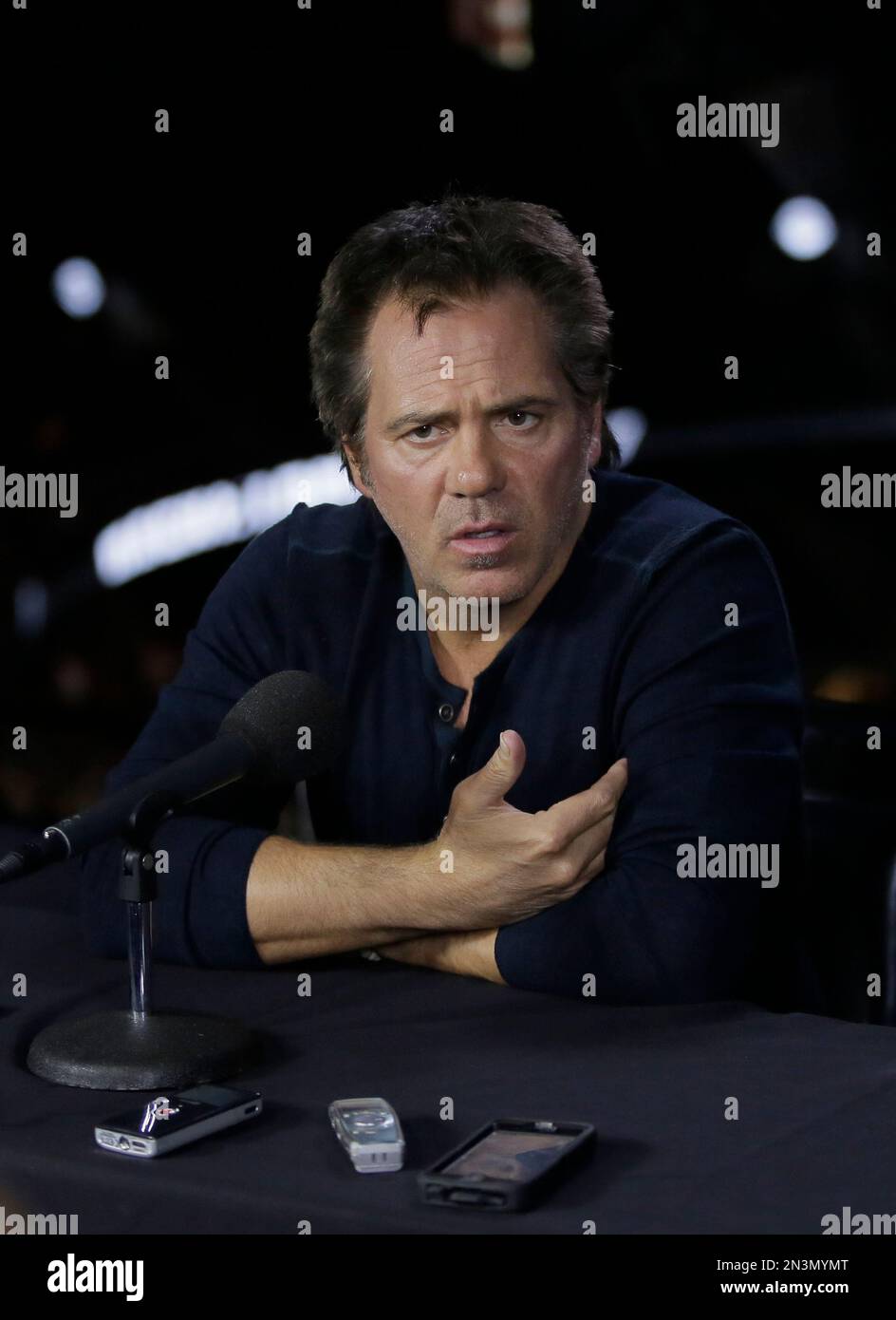 Detroit Pistons owner Tom Gores answers a reporters questions during a ...