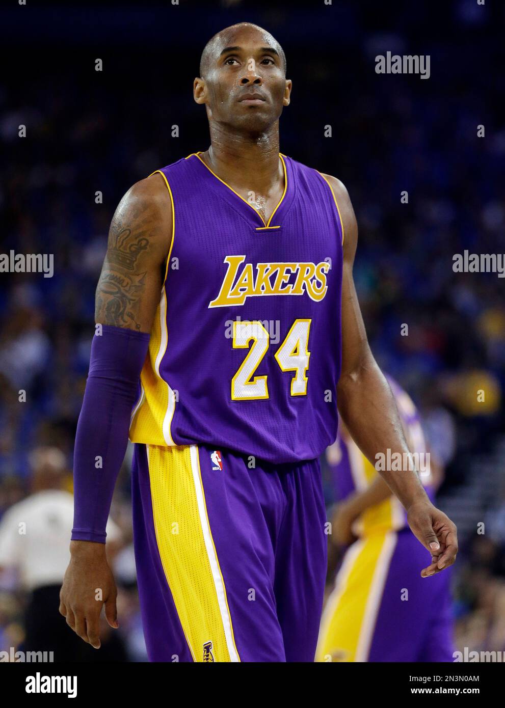 Los Angeles Lakers' Kobe Bryant walks off the court during the first ...