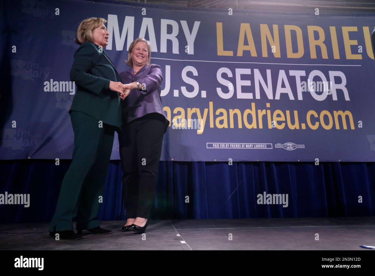 Former Secretary of State Hillary Clinton, left, reacts to Sen. Mary ...