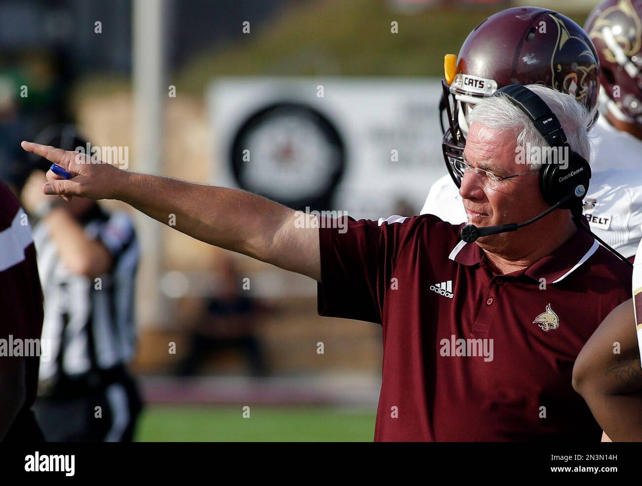 Texas State coach Dennis Franchione gives instructions to one of his ...