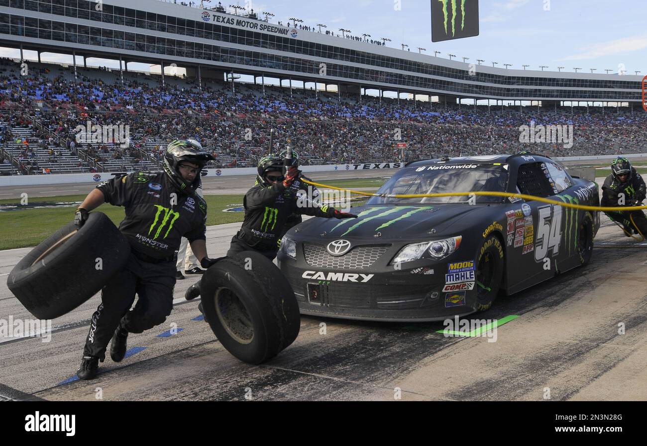 Kyle Busch makes a pit stop on the way to winning the NASCAR Nationwide ...