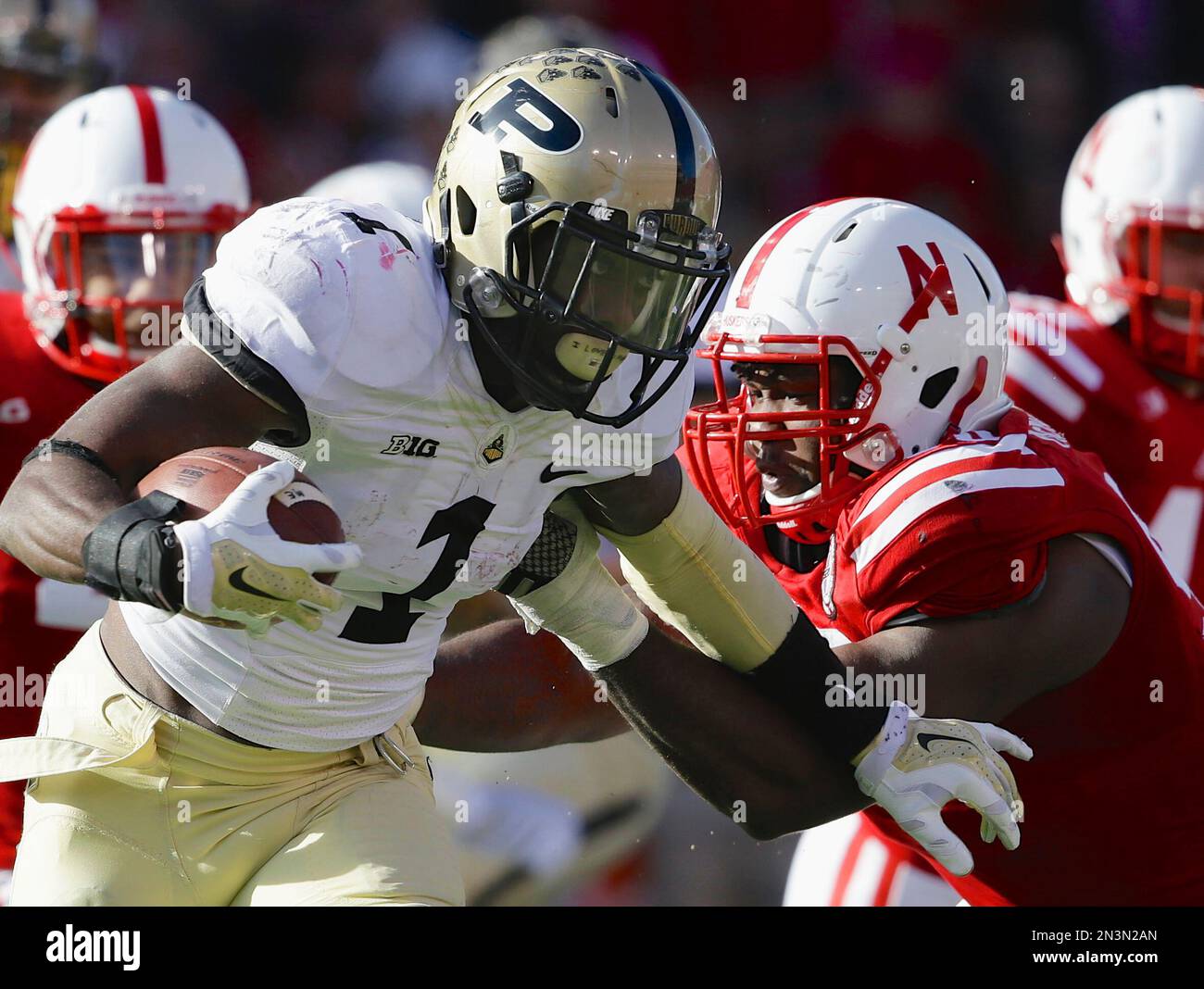 Purdue running back Akeem Hunt (1) runs away from Nebraska defensive ...