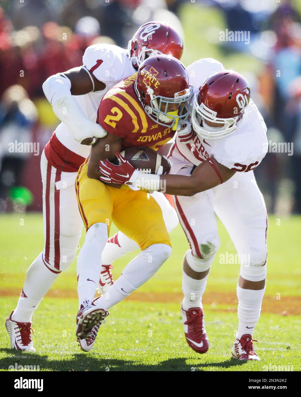 Iowa State running back Aaron Wimberly (2) is tackled by Oklahoma's ...