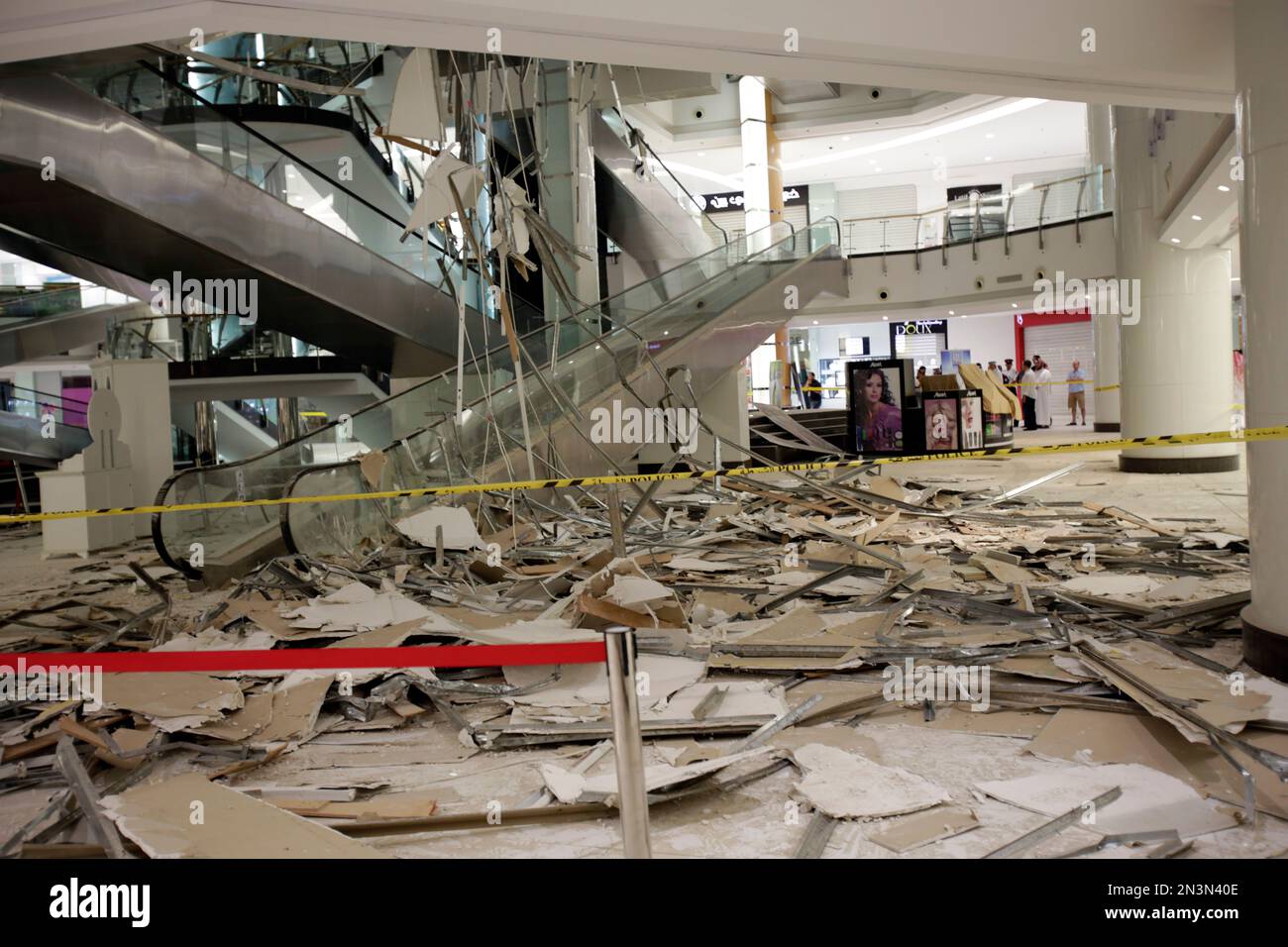 Debris from damage caused by a partial roof collapse at a shopping mall ...