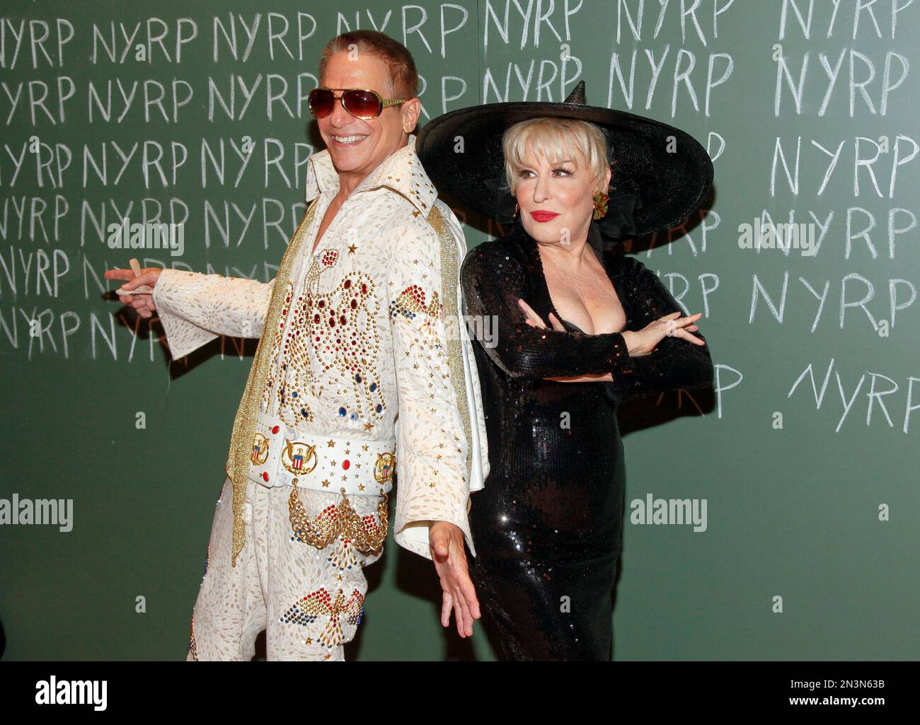 Tony Danza, left, and Bette Midler, right, attend Bette Midler's 2014 ...