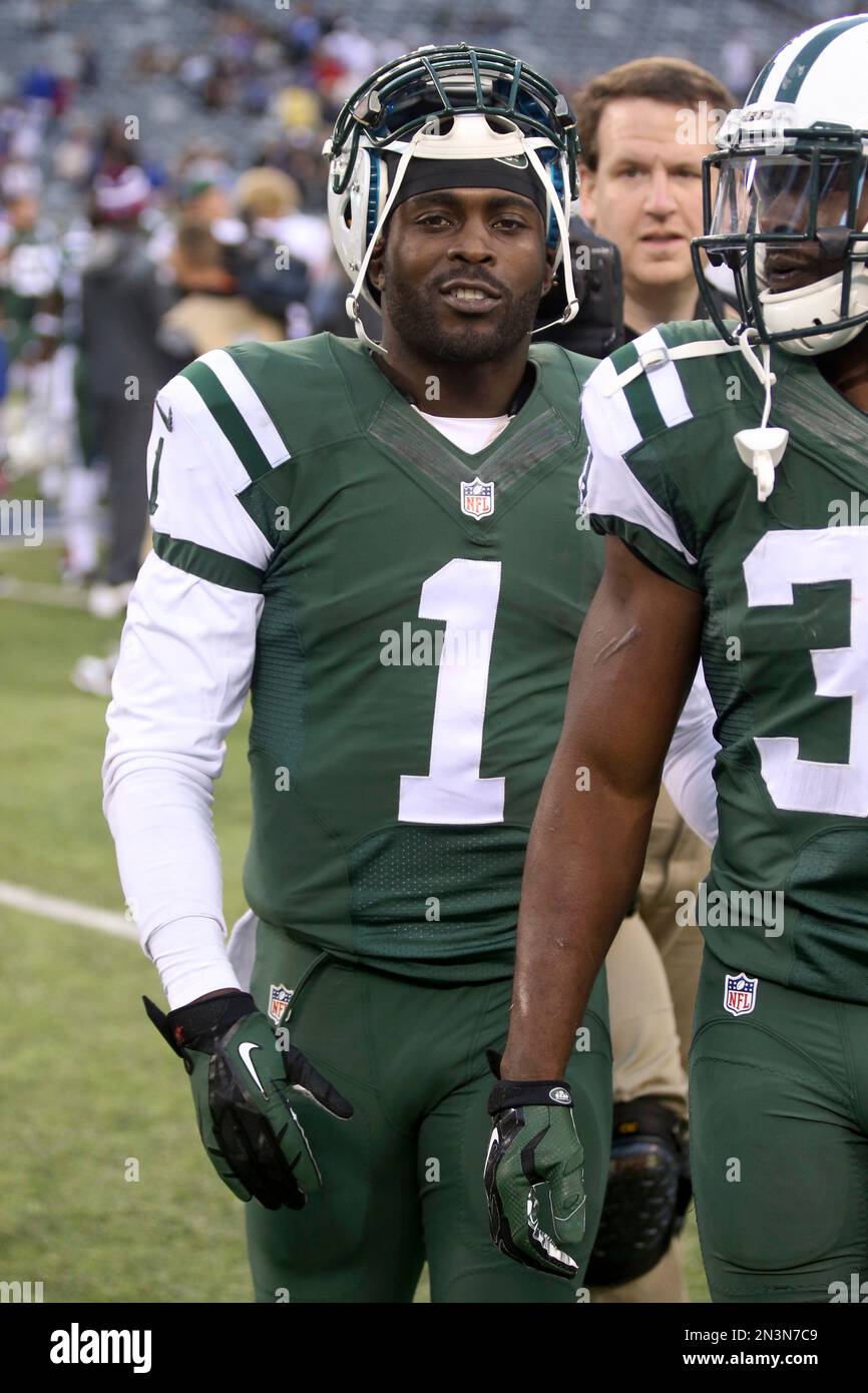 New York Jets quarterback Michael Vick #1after his game against the ...