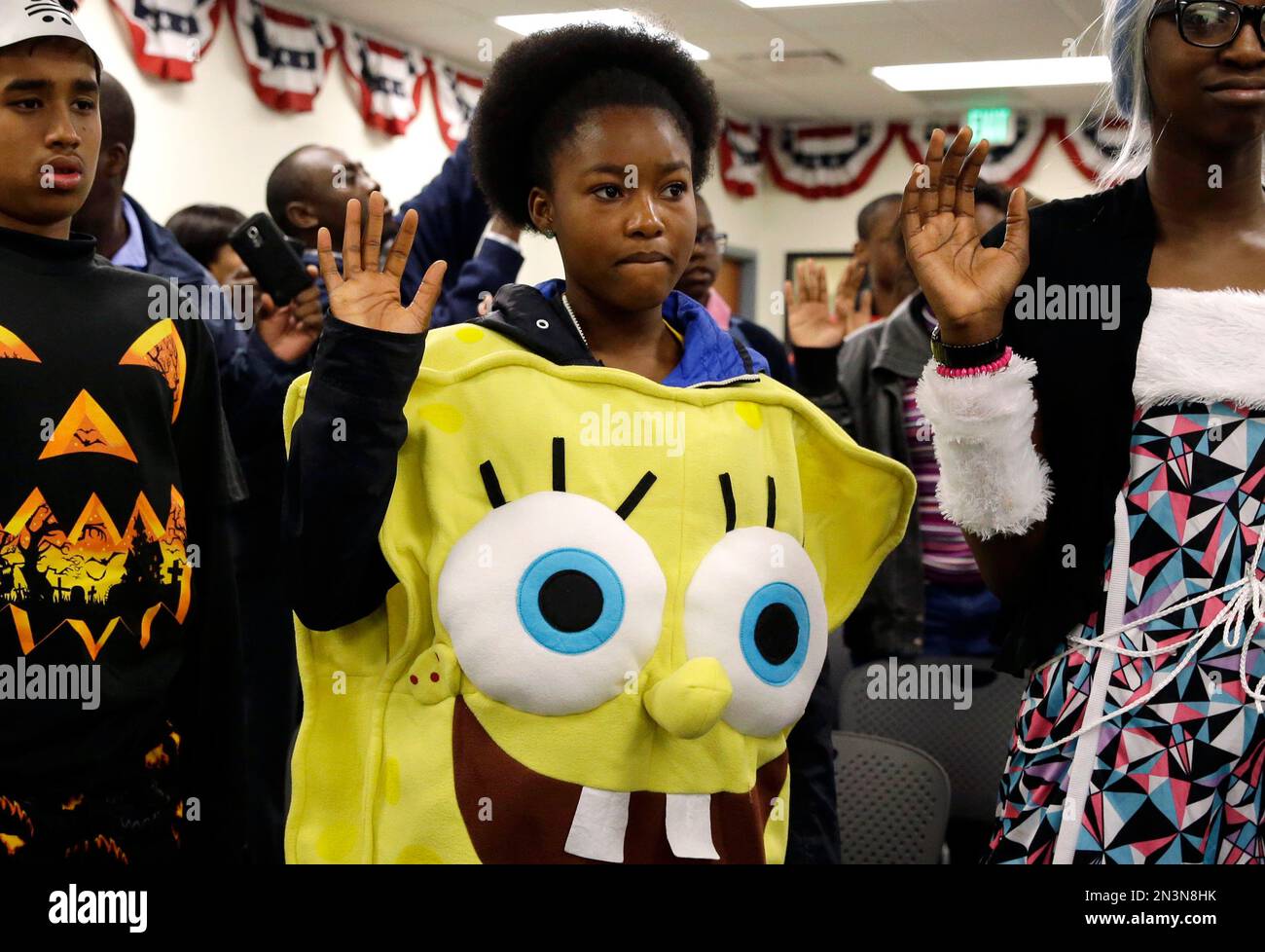 Theresa Kumazah, of Ghana, wears a SpongeBob SquarePants costume as she ...