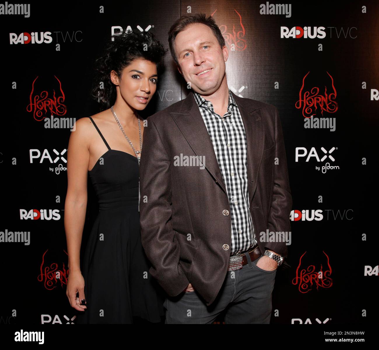 Producer Adam Stone (right) and guest attend a special screening of ...