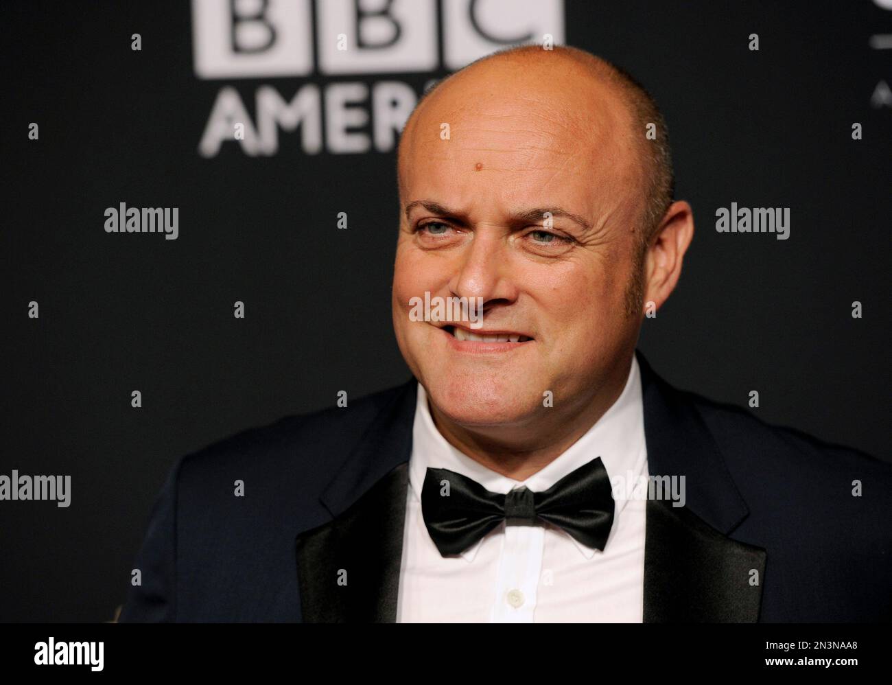 Nigel Daly, chairman of the board of directors for BAFTA LA, arrives at ...