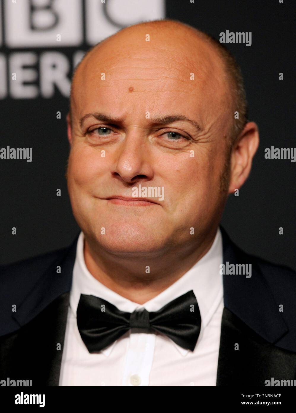 Nigel Daly, chairman of the board of directors for BAFTA LA, arrives at ...