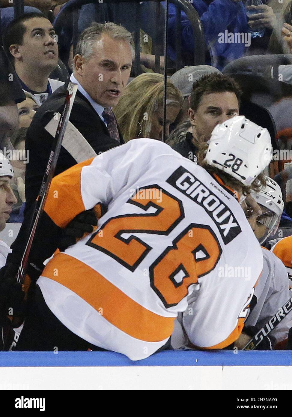 Philadelphia Flyers head coach Craig Berube talks to center Claude ...