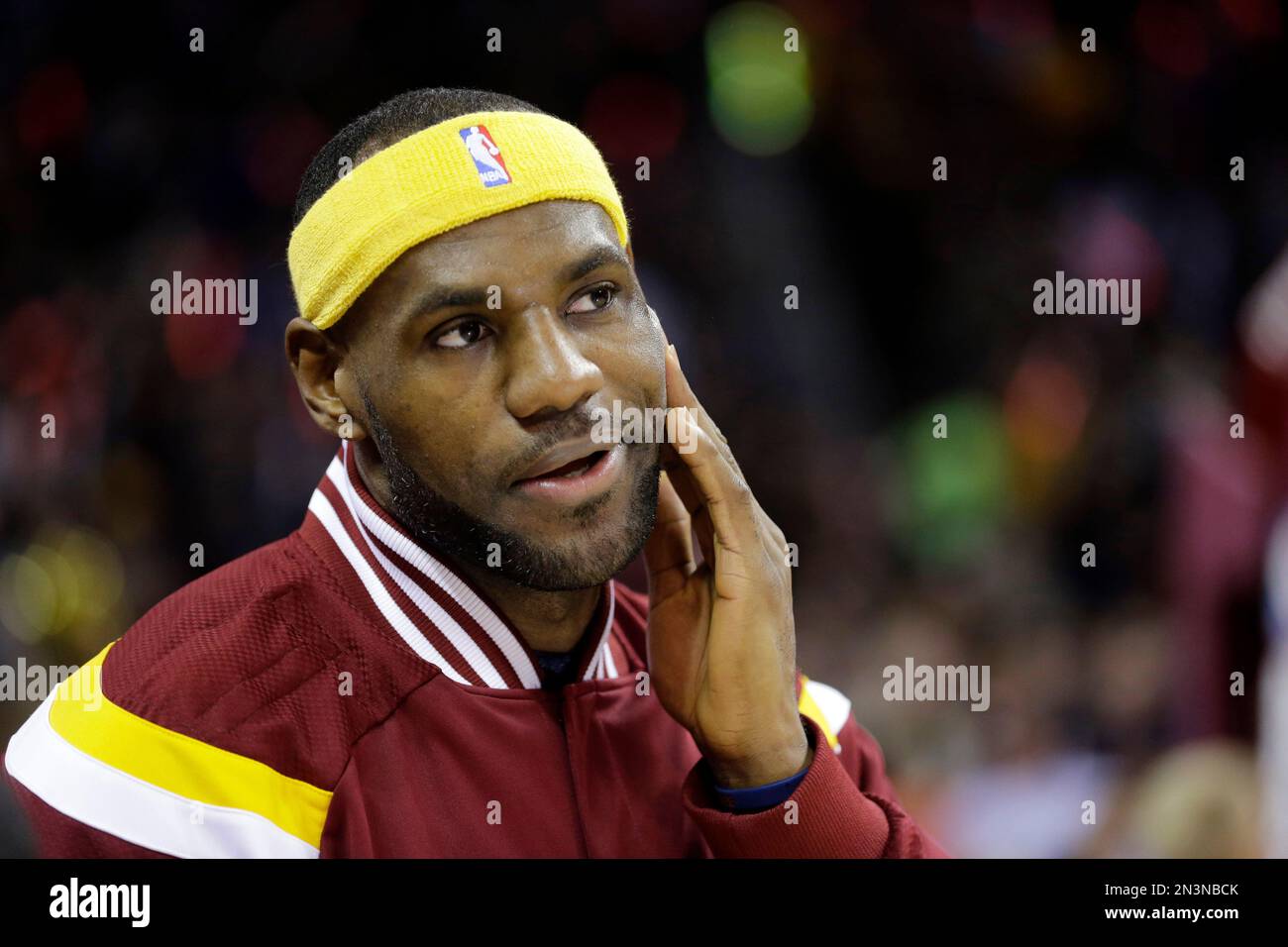 Cleveland Cavaliers' LeBron James watches his team warm up before an ...