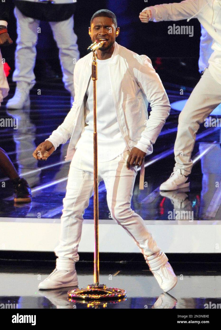 FILE - In this Aug. 24, 2014 file photo, Usher performs on stage at the ...