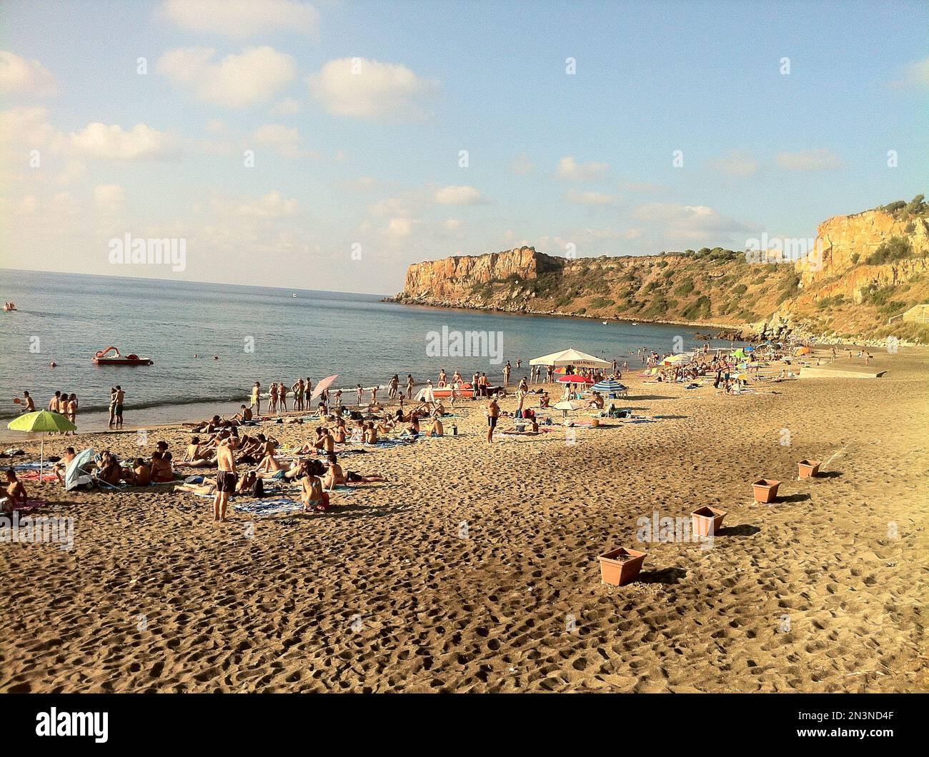 This Aug. 2014, photo shows beach-goers at the Torre Conca beach near ...