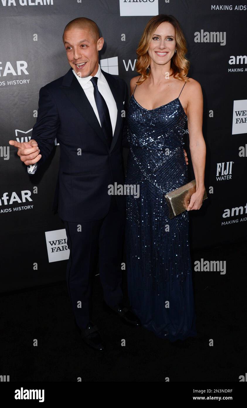 Theo Rossi, left, and Meghan McDermott arrive at the 2014 amfAR ...