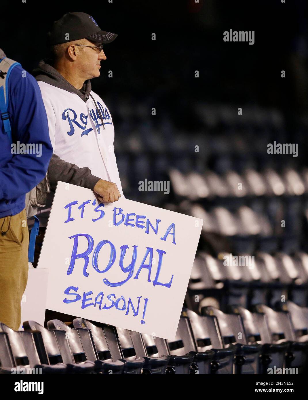 A Kansas City Royals fan looks to the field after Game 7 of baseball's ...