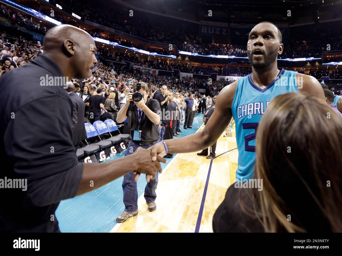 Charlotte Hornets owner Michael Jordan, left, congratulates Al ...