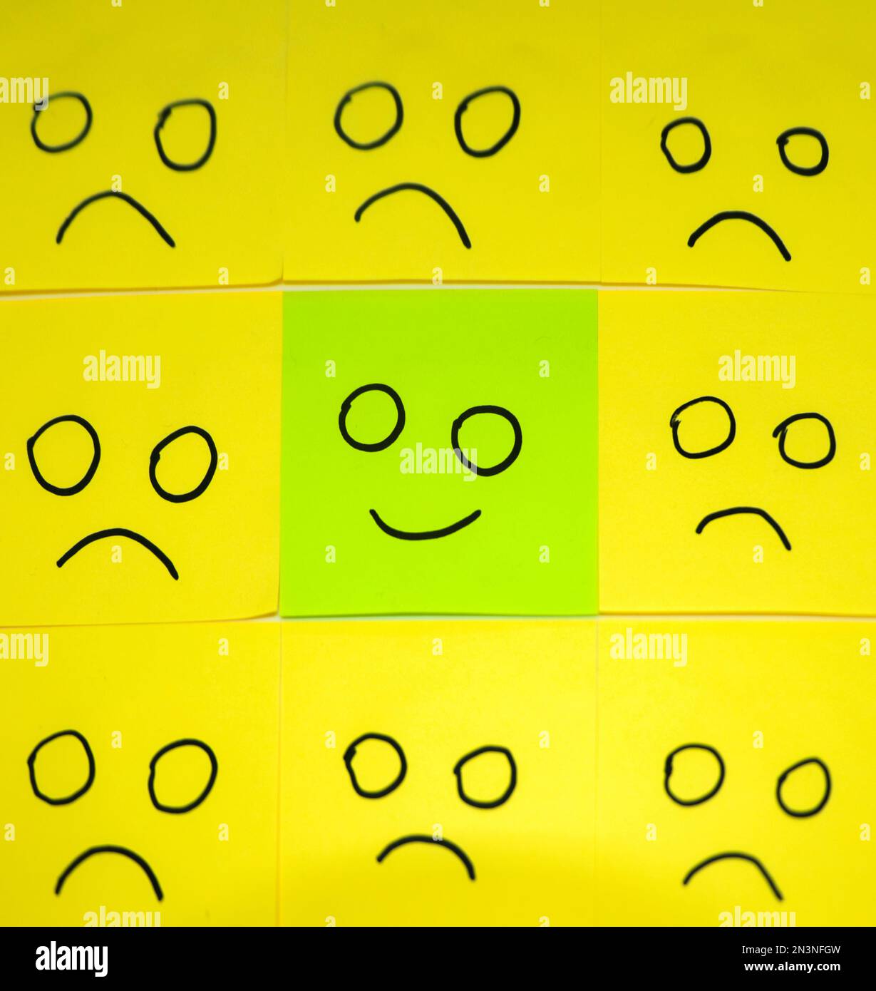 concept for a positive attitude with small office notes with multiple ...