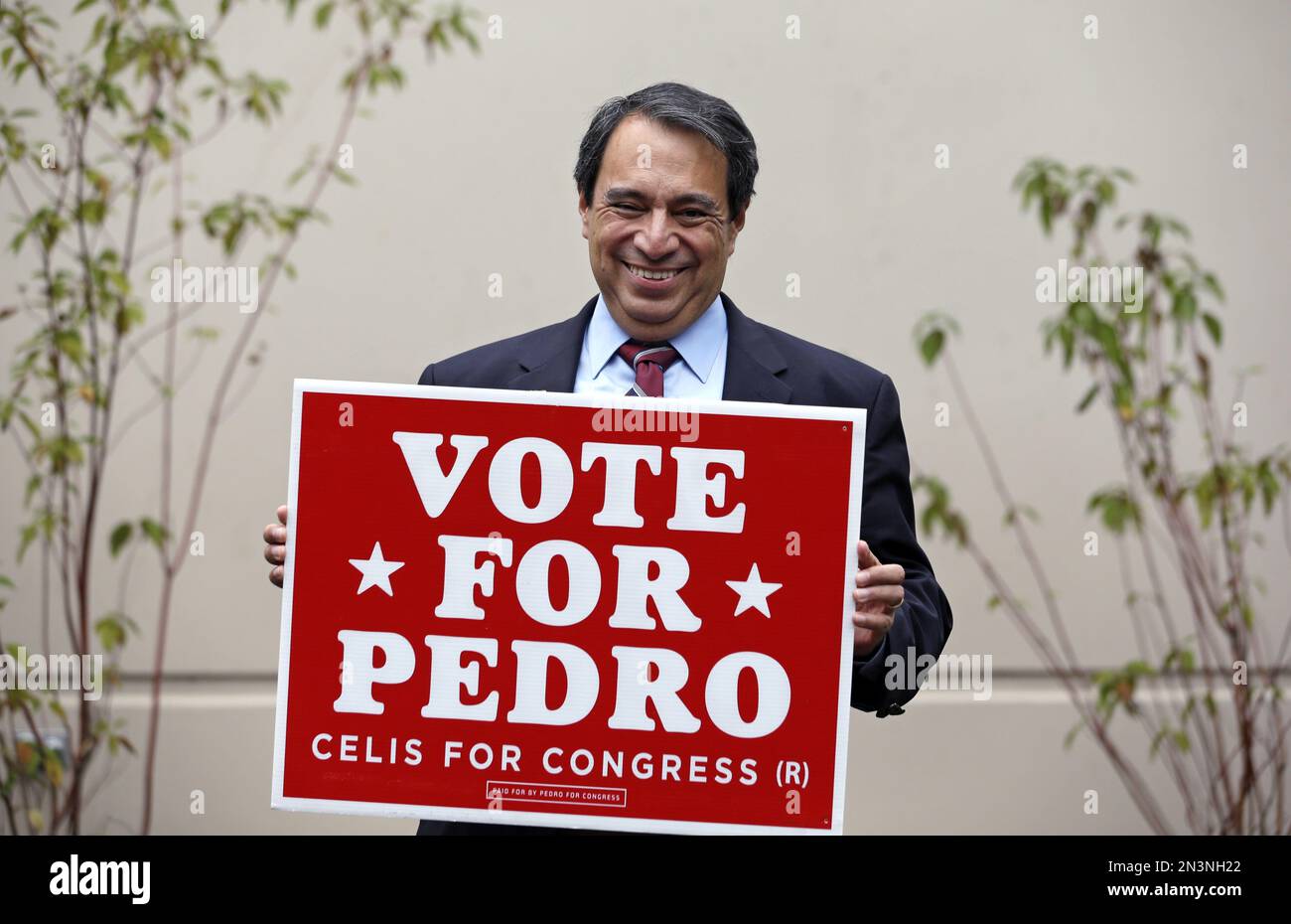 In this photo taken Tuesday, Sept. 23, 2014, Pedro Celis, a Republican ...