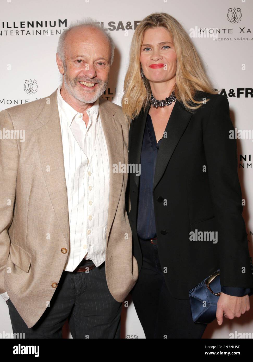 Director Michael Radford and wife Emma Tweed attend the premiere of ...