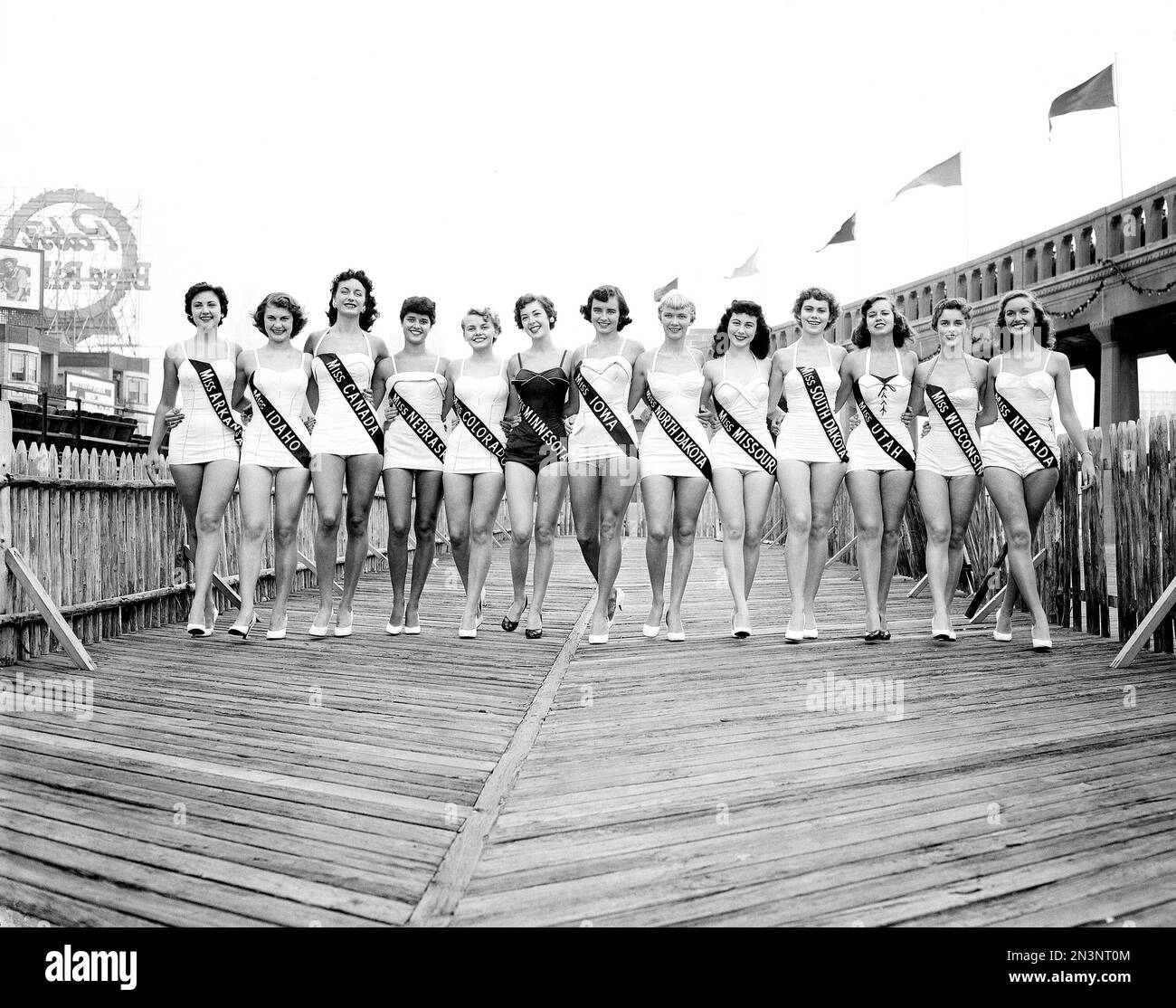 Thirteen hopefuls for the title Miss America stroll the boardwalk at ...
