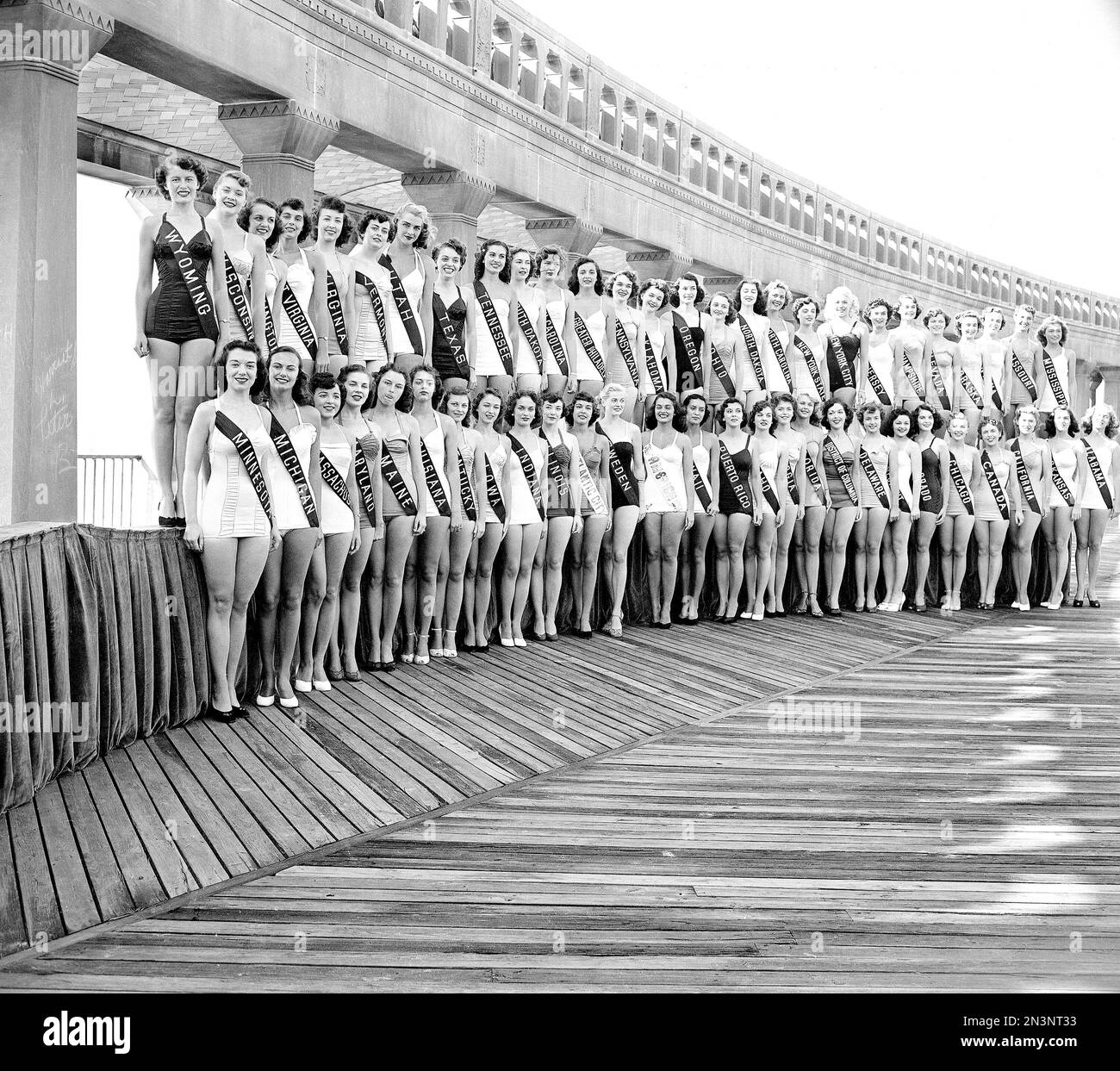 These women line the boardwalk at Atlantic City, N.J., on Sept. 4, 1951 ...