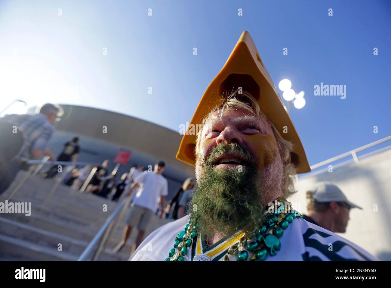 Green Bay Packers fan Randy Larose of Cadott, Wisc., shows off his ...