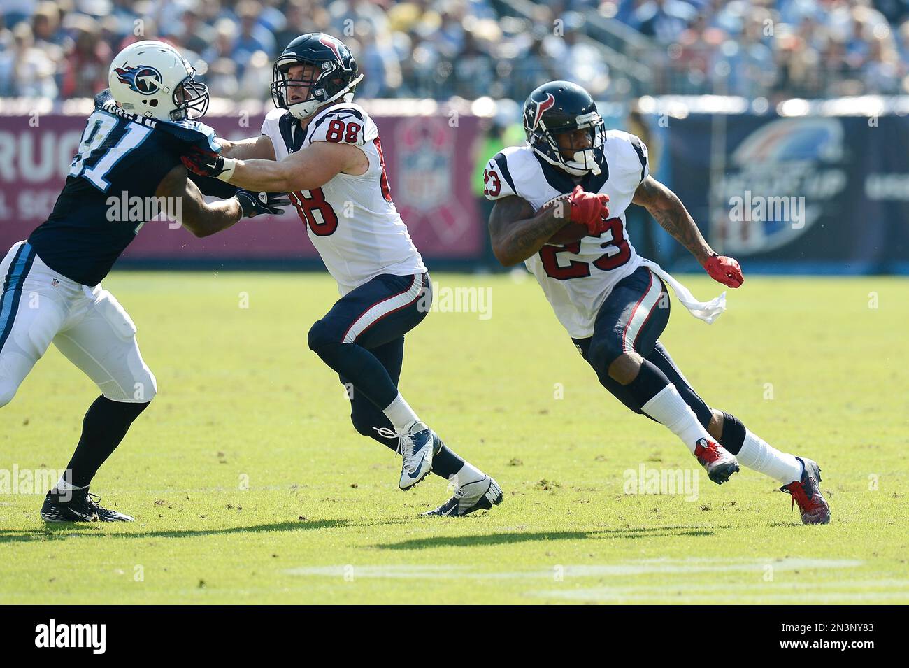 Houston Texans running back Arian Foster (23) tries to get past ...